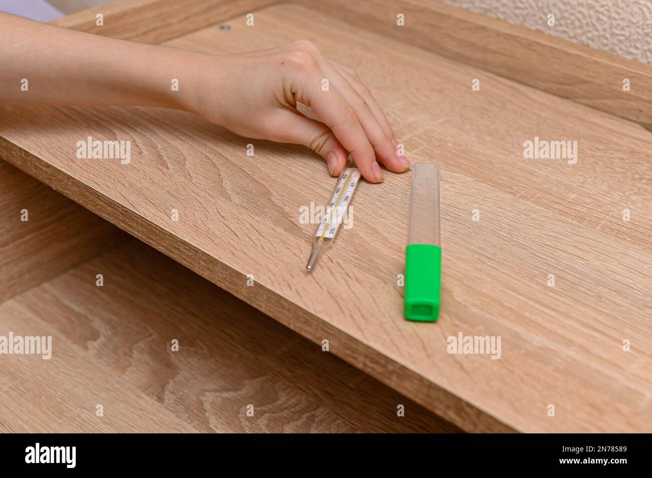 Close-up of a traditional thermometer for measuring body temperature in ...