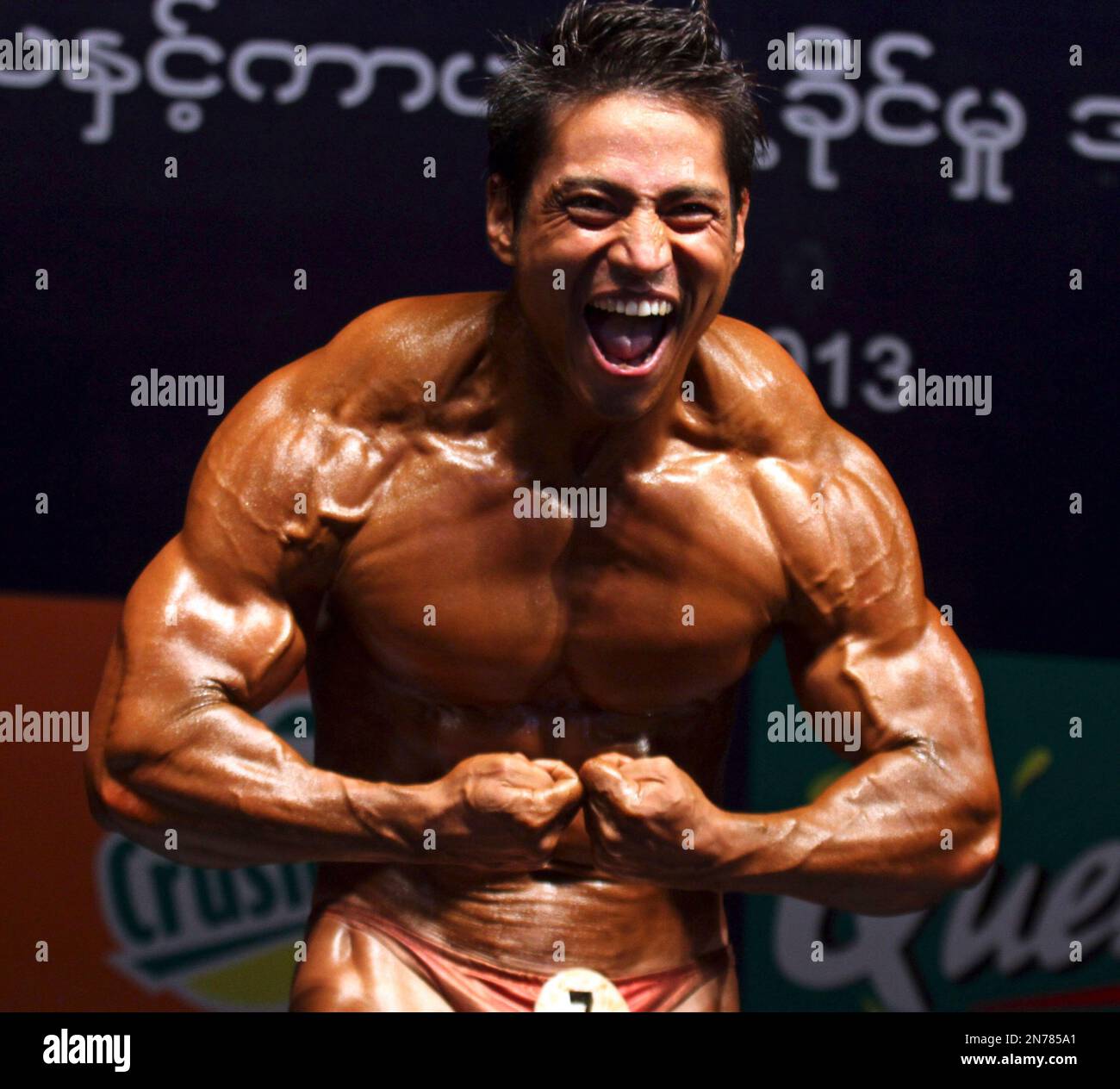 A bodybuilder competes during their bodybuilding contest organized by ...