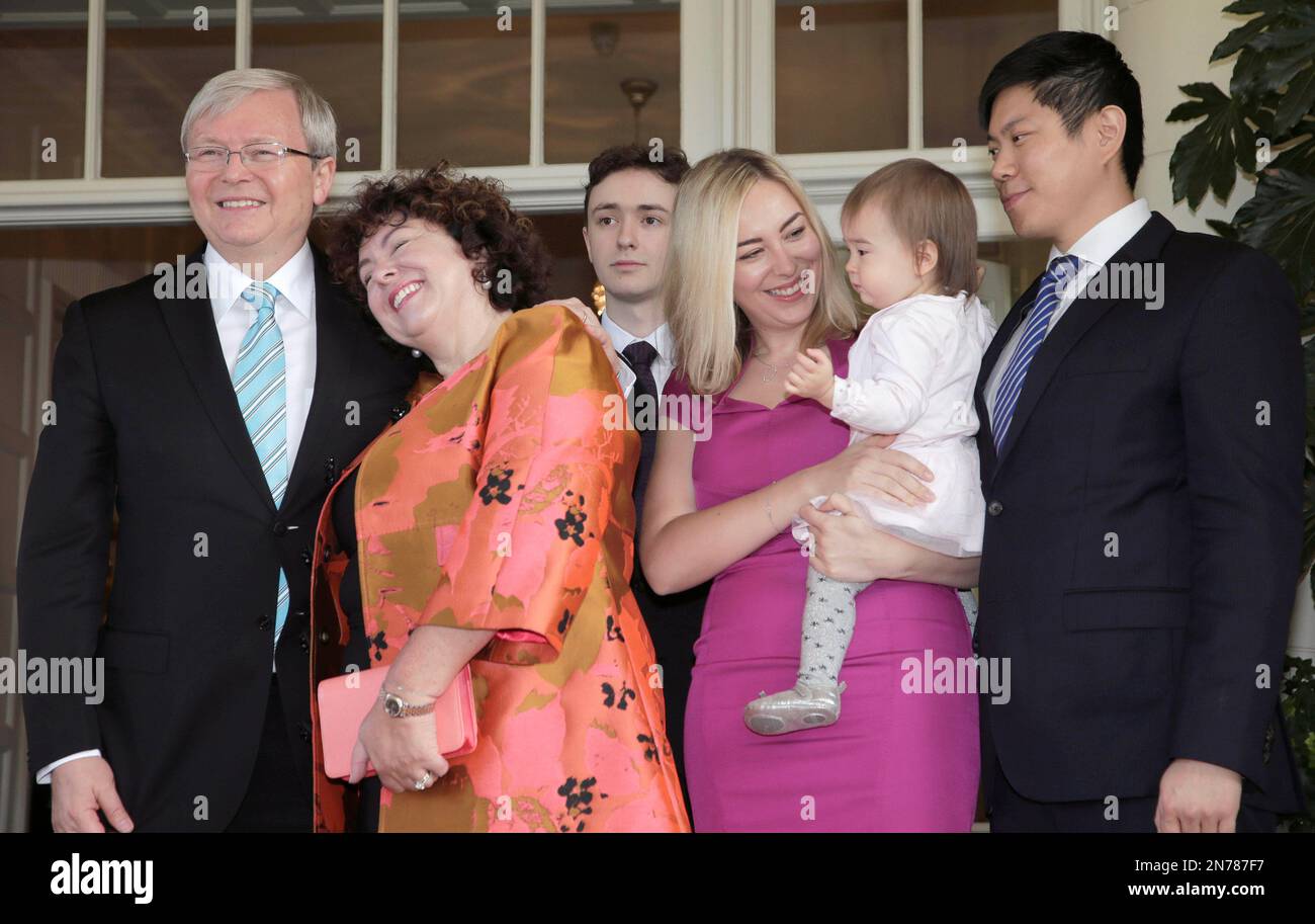 Newly commissioned Australian Prime Minister Kevin Rudd, left, has his ...