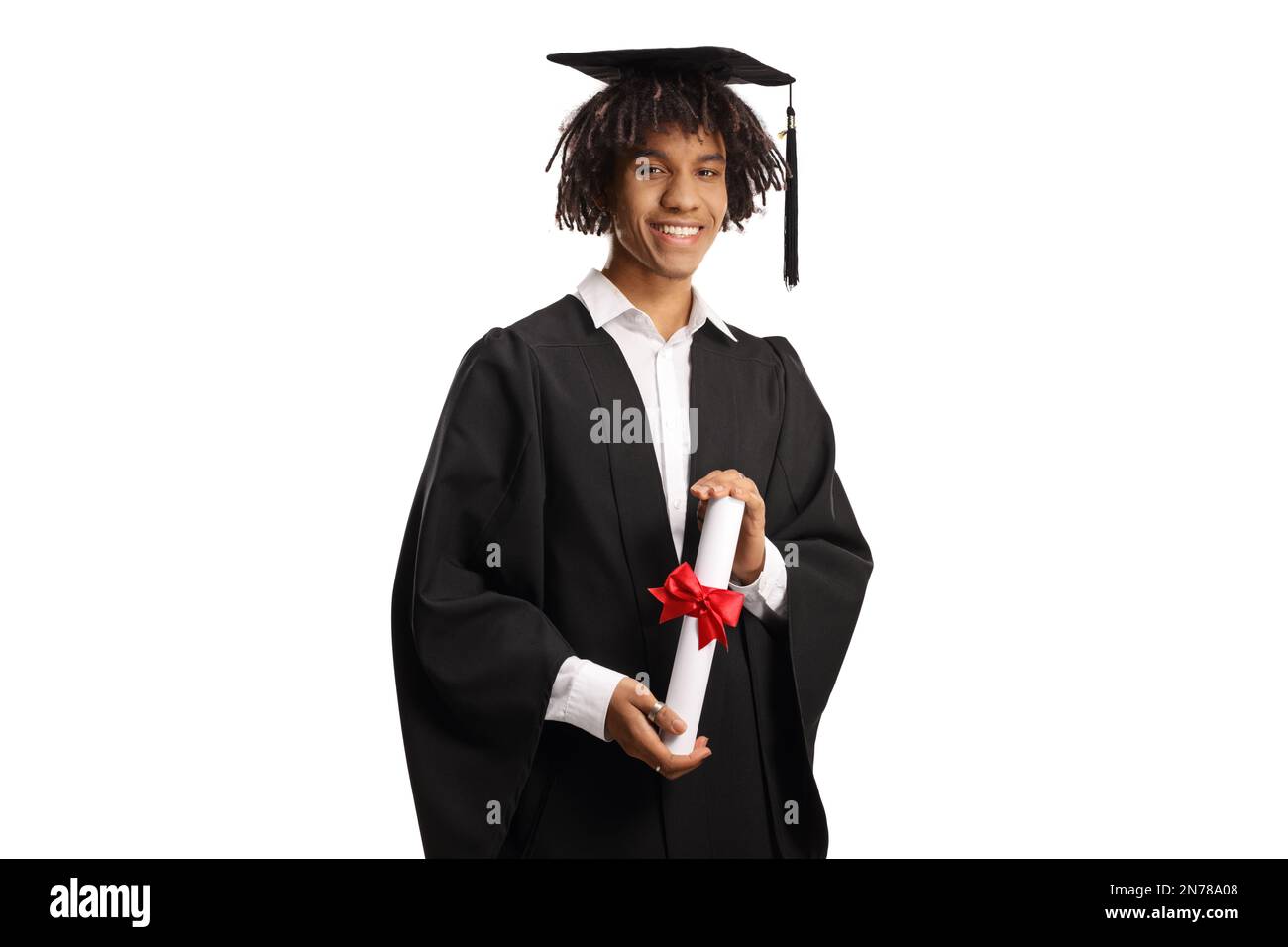 Young male african american student wearing a graduation gown and ...