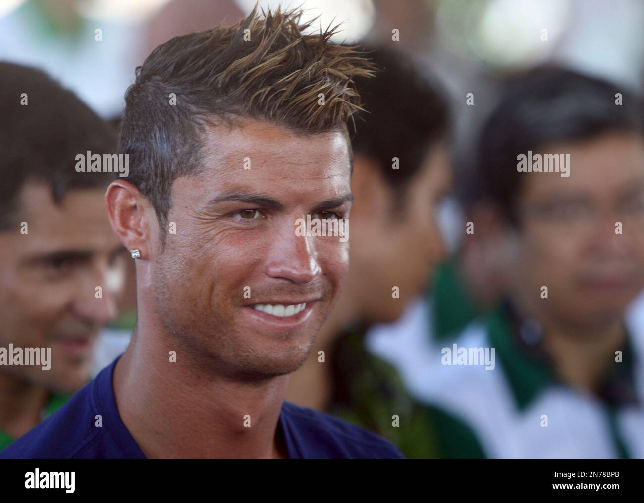 Soccer star Cristiano Ronaldo attends a tree-planting event in a ...