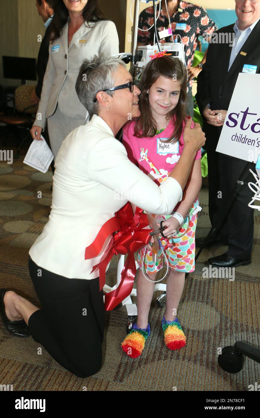 Jamie Lee Curtis visits with a patient at Colgate-Palmolive donation of ...