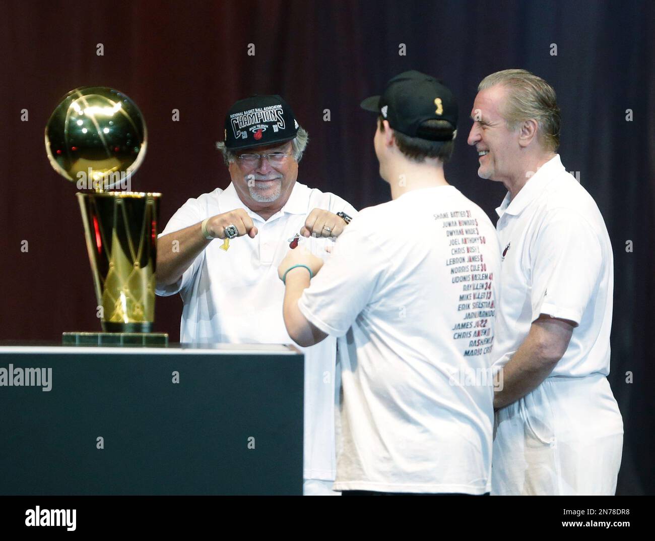 Micky Arison, Miami Heat managing general partner, rear, fist bumps his ...