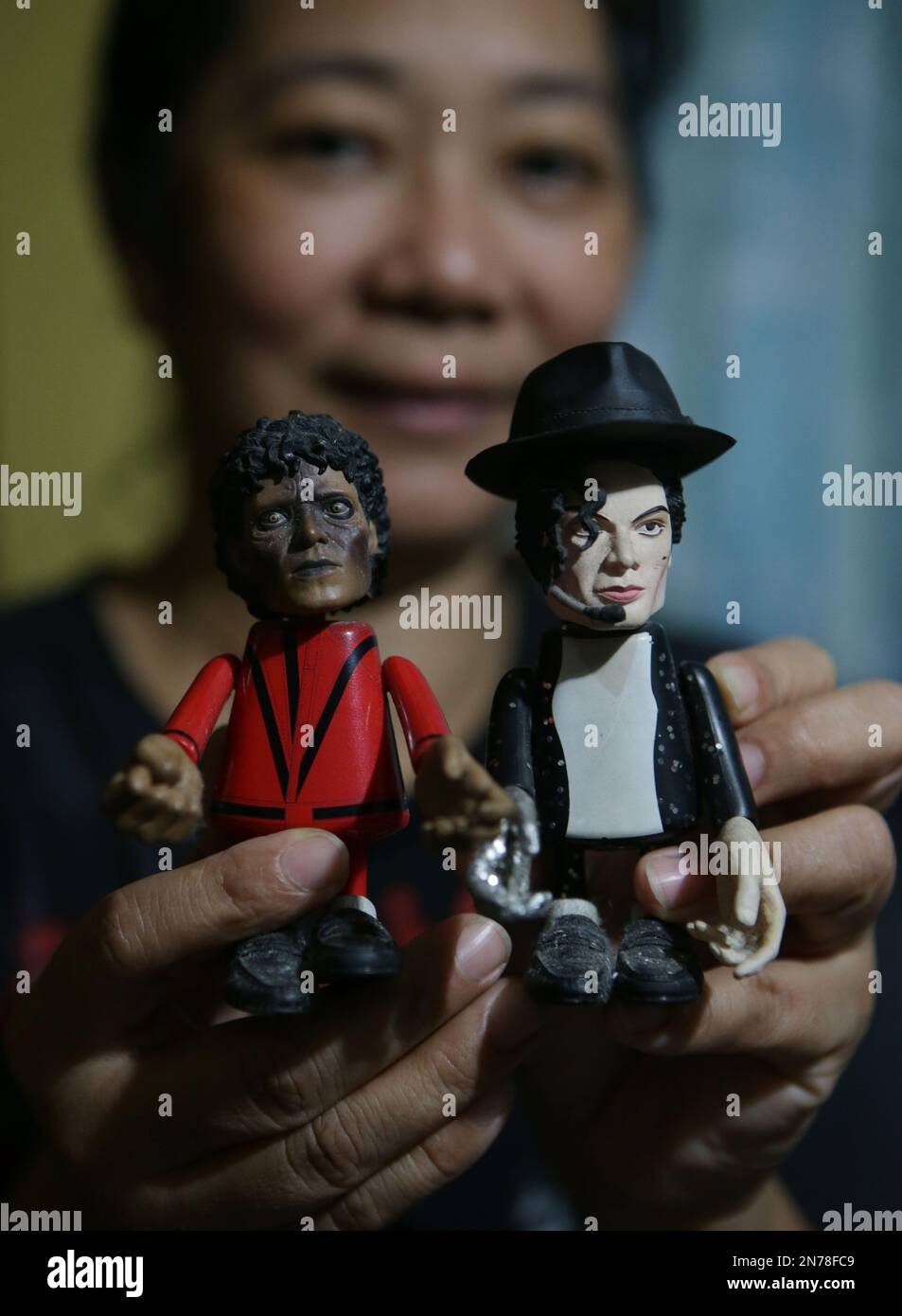 Filipino fan Elizana Mamucud shows Michael Jackson dolls at her house ...