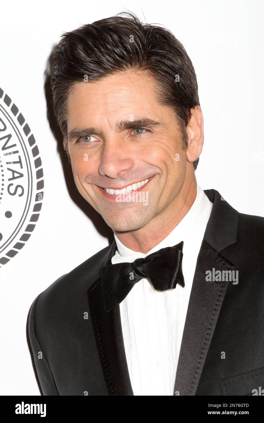 Actor John Stamos poses for photos at the Friars Club Roast of Don ...