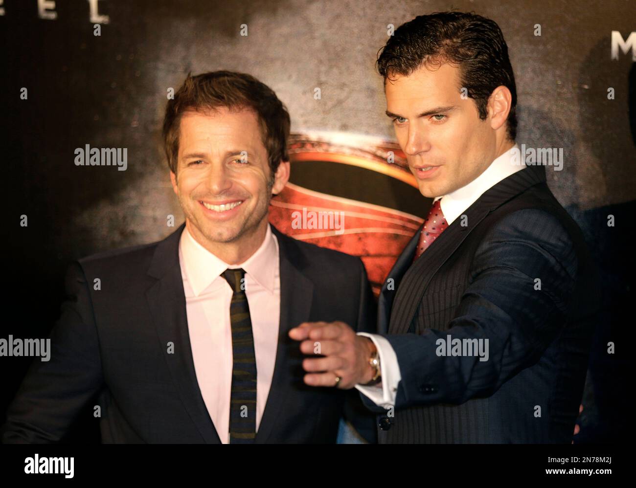 Director Zack Snyder, left, and actor Henry Cavill pose for a photo as ...