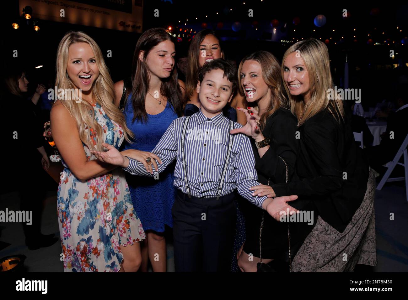River Alexander (center) is mobbed by fans at the premiere of Fox ...