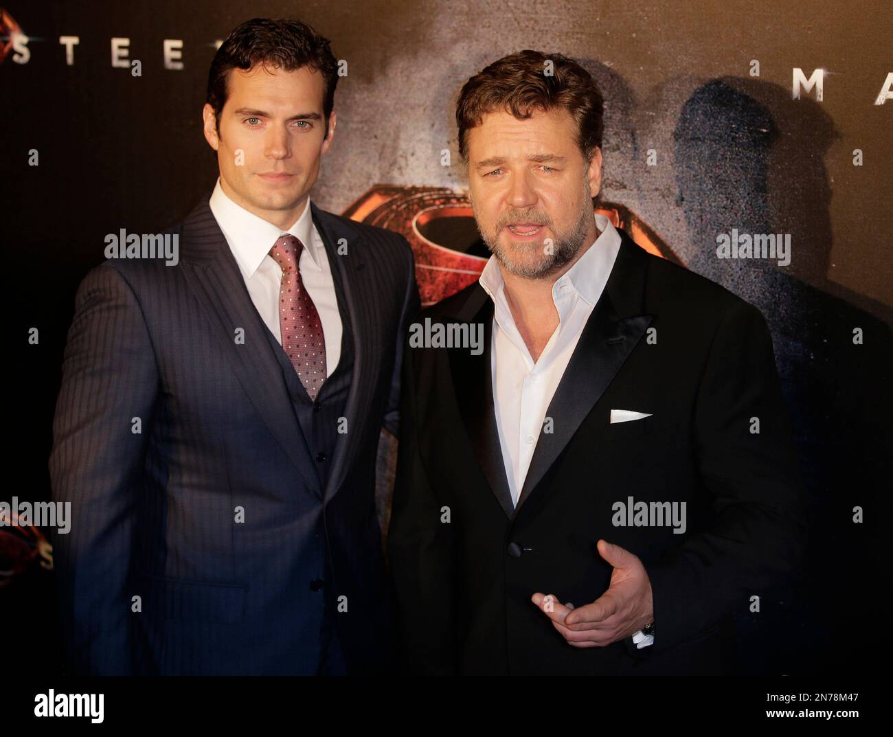 Actors Russell Crowe, right, and Henry Cavill pose for photos on the ...
