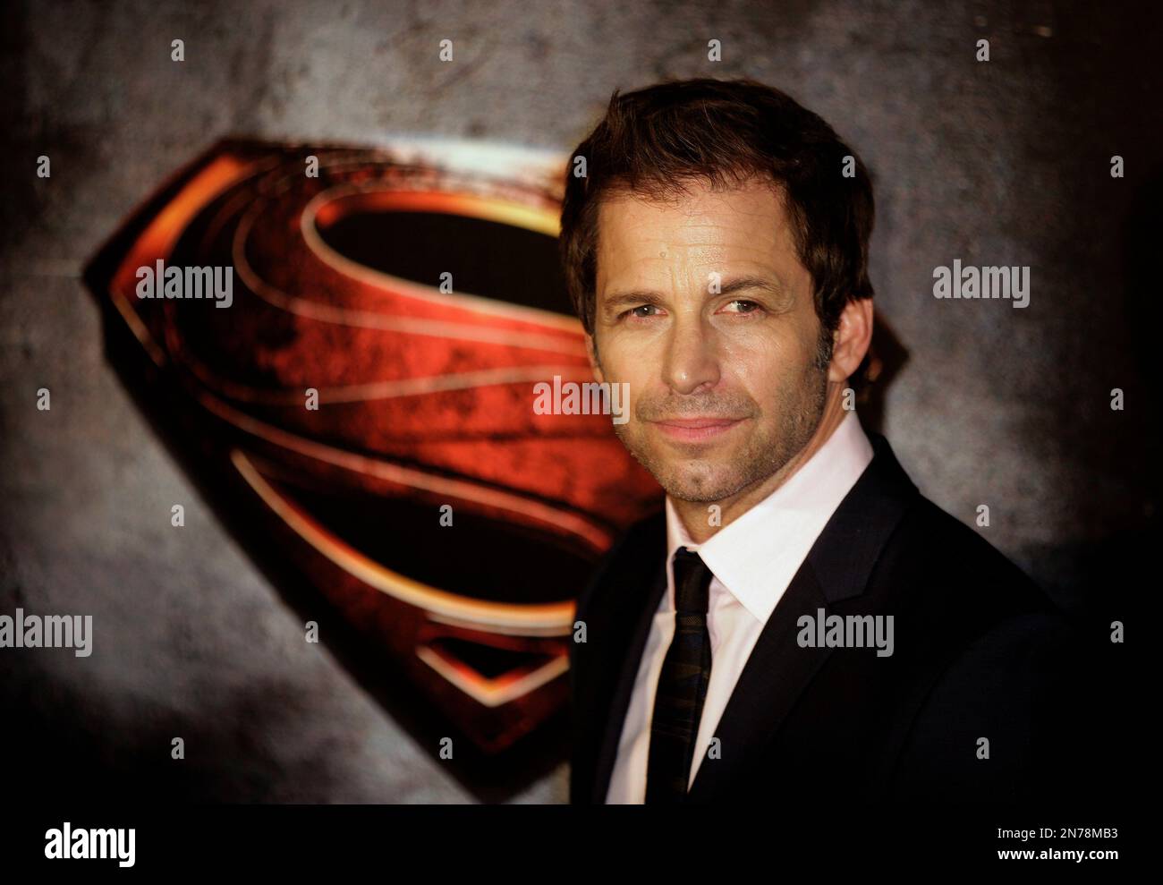 Director Zack Snyder poses for a photo as he walks the red carpet for ...