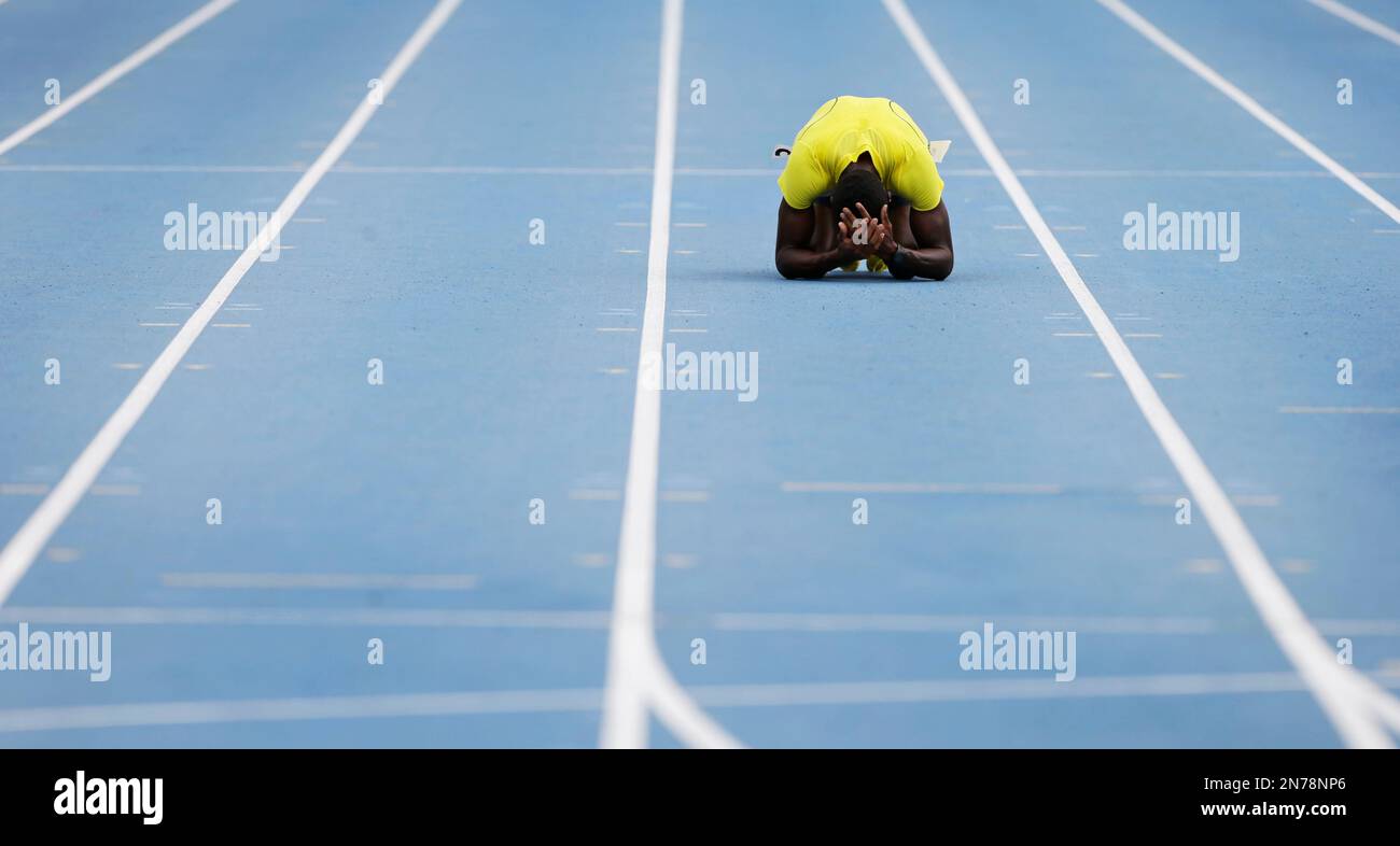 Curtis Mitchell reacts on the track after finishing in third place in ...
