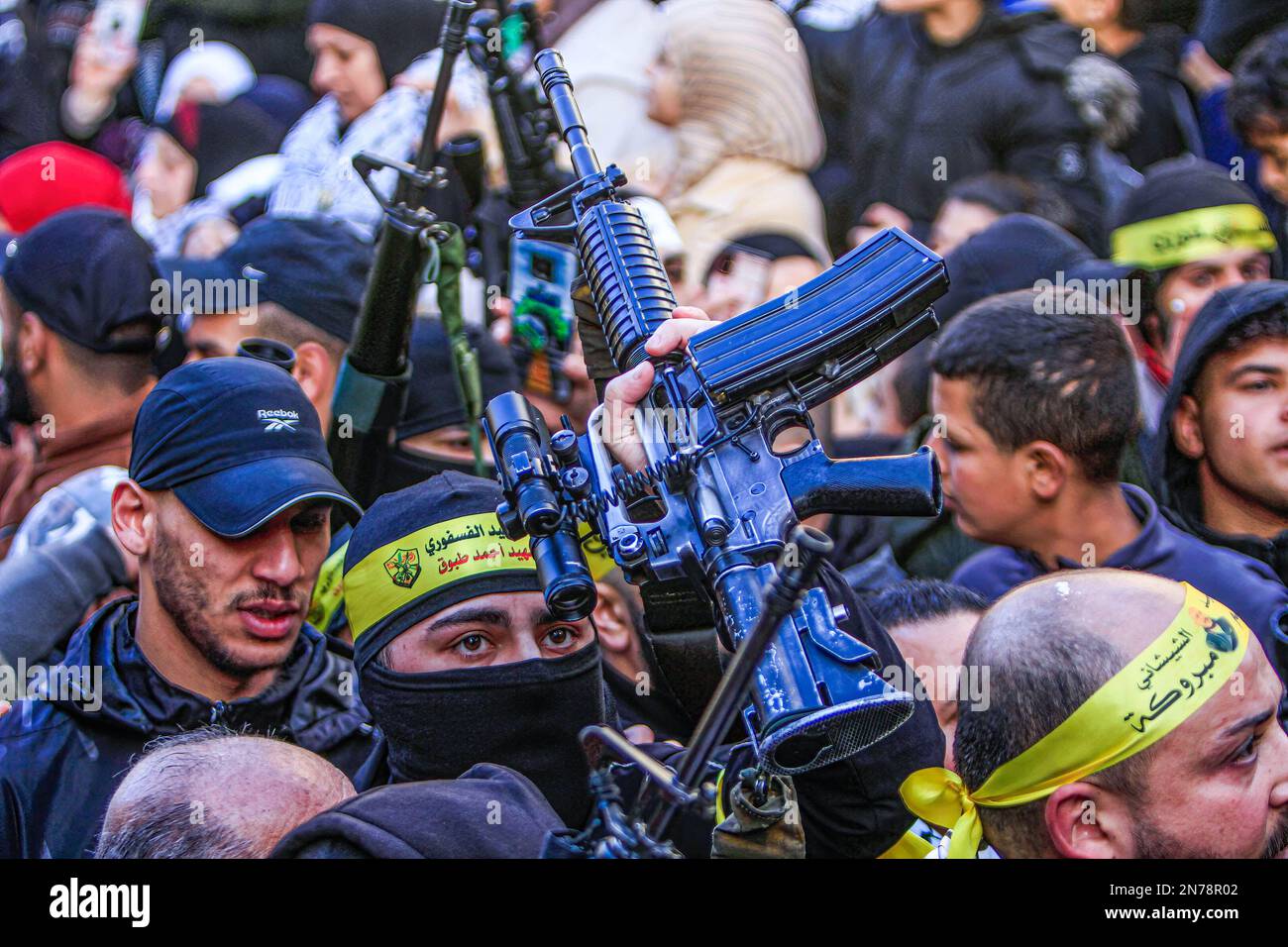 Masked Palestinian gunmen, some of them from the Lions' Den groups ...
