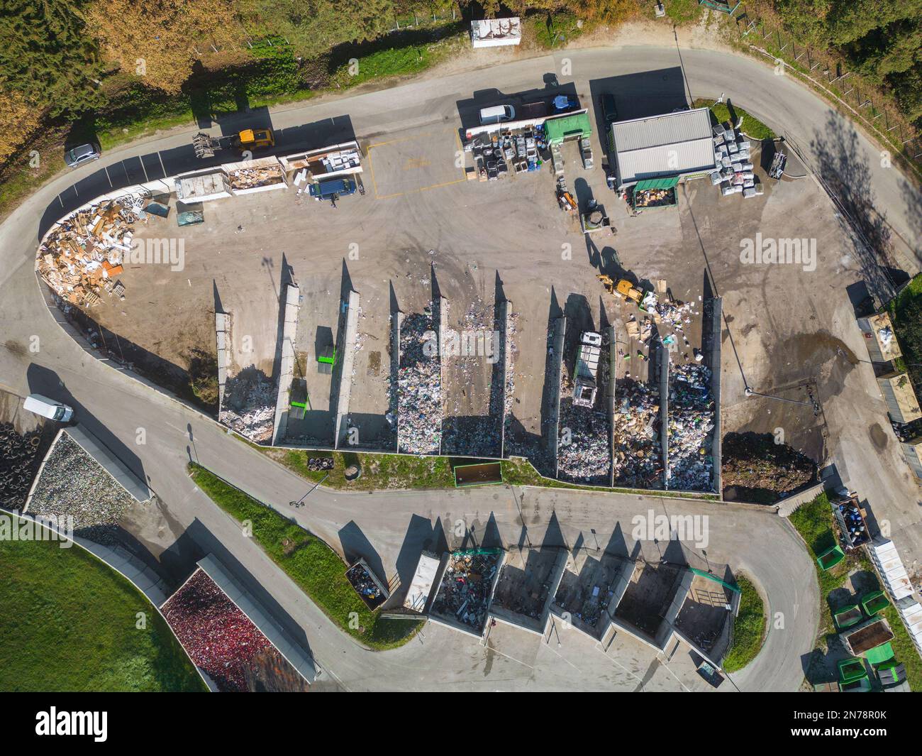 Landfill site, a pile of stinky different junk disposal in the concrete ...