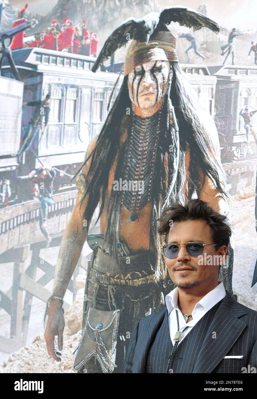 Johnny Depp attends the world premiere of "The Lone Ranger" at Disney ...