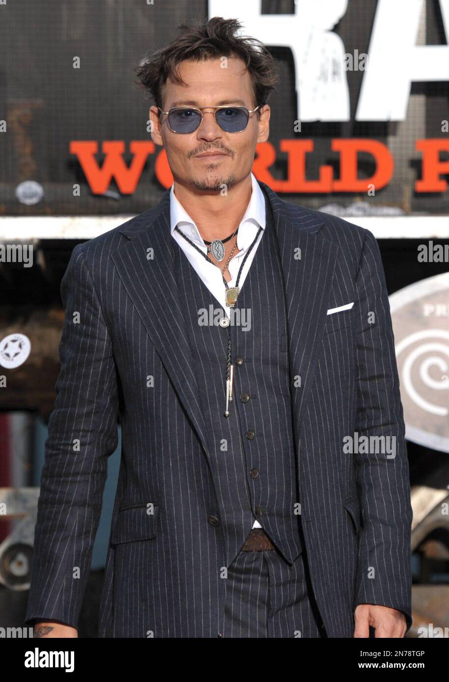 Johnny Depp appears on stage at the world premiere of "The Lone Ranger ...