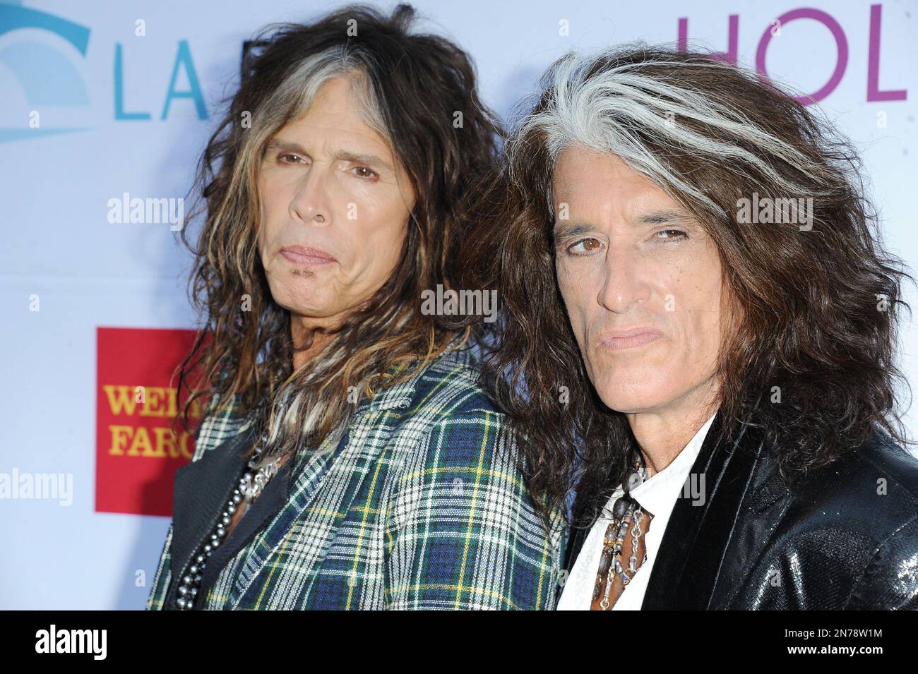 Steven Tyler, at left, and Joe Perry arrive at the 2013 Hollywood Bowl ...