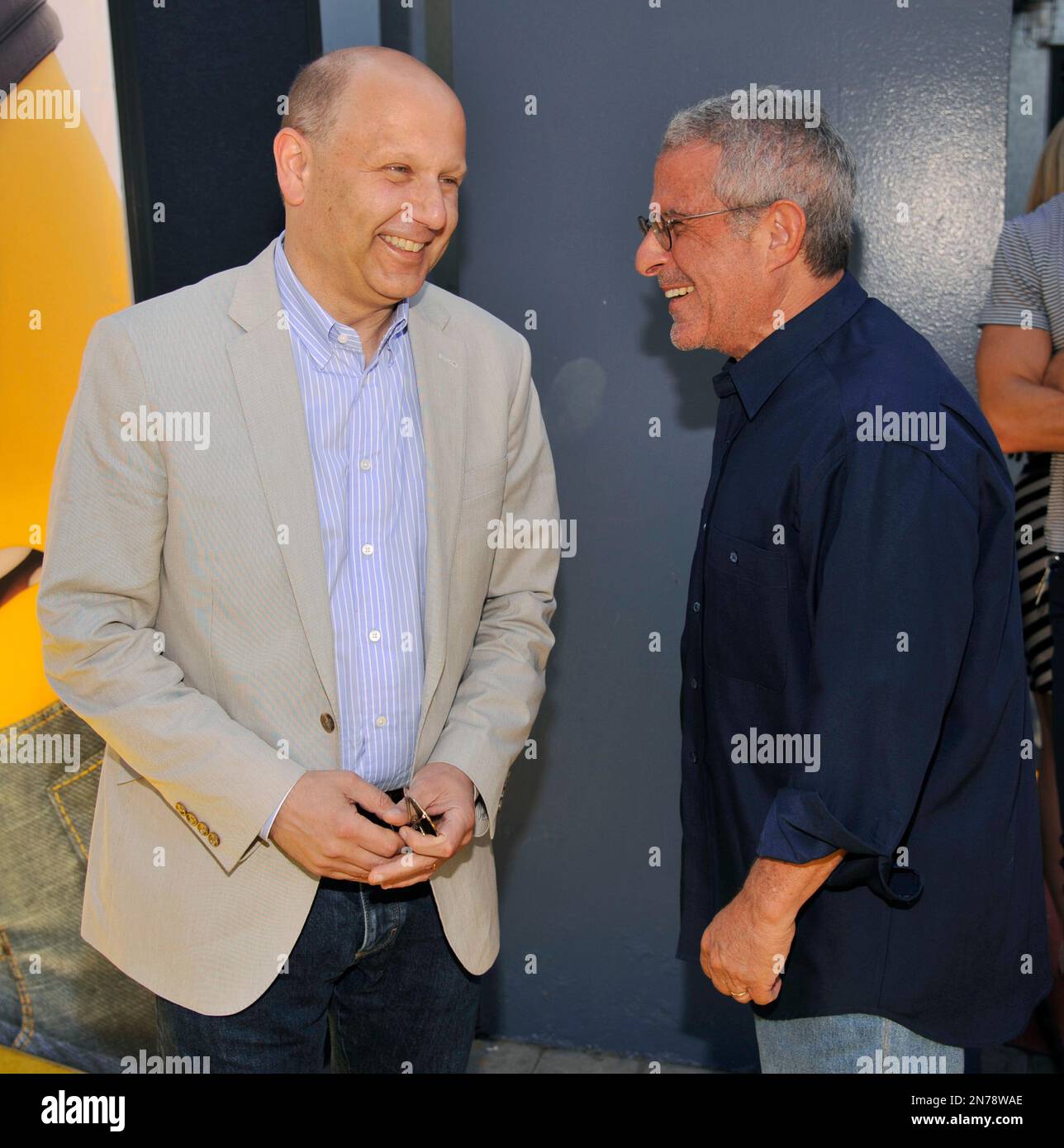 Chris Meledandri, left, producer of "Despicable Me 2," mingles with Ron ...