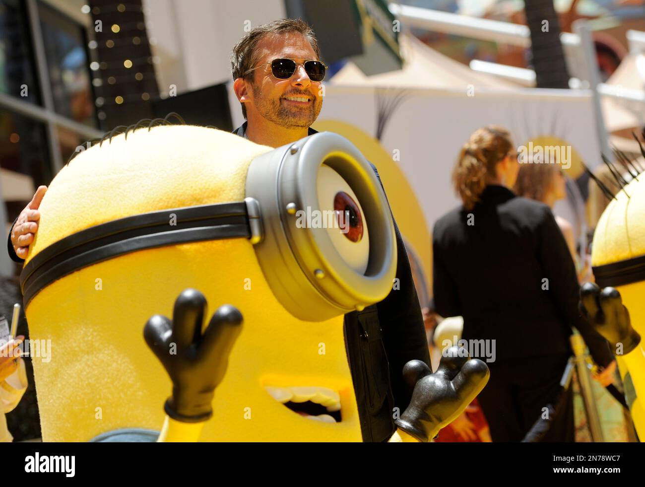 Steve Carell, a cast member in "Despicable Me 2," poses with a minion ...