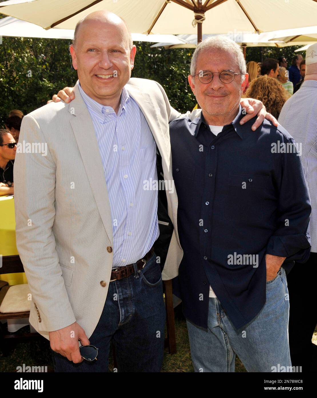 Chris Meledandri, left, producer of "Despicable Me 2," poses with Ron ...