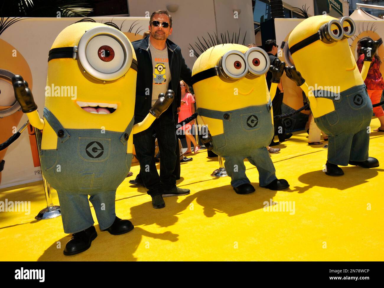 Steve Carell, a cast member in "Despicable Me 2," poses with minion ...