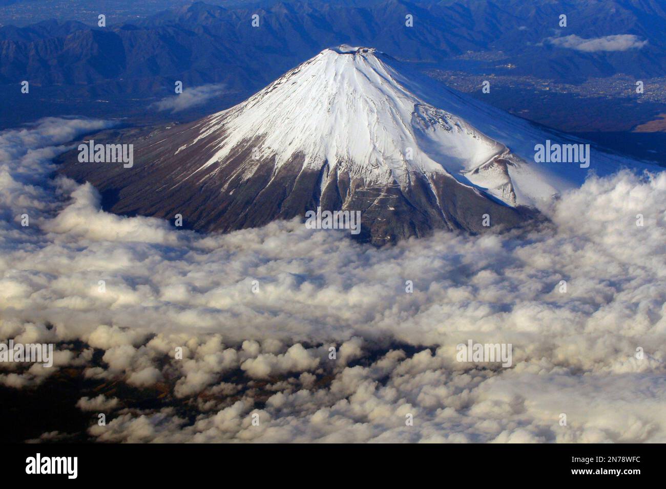 FILE - In this Dec. 8, 2010 file photo, snow-covered Mount Fuji, Japan ...