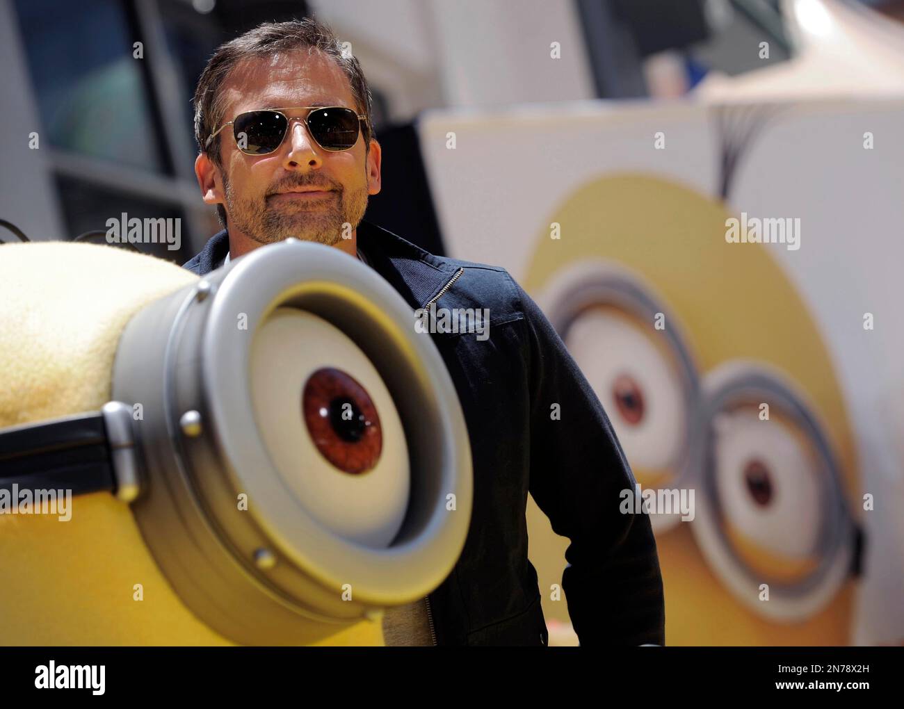 Steve Carell, a cast member in the "Despicable Me 2," poses alongside a ...