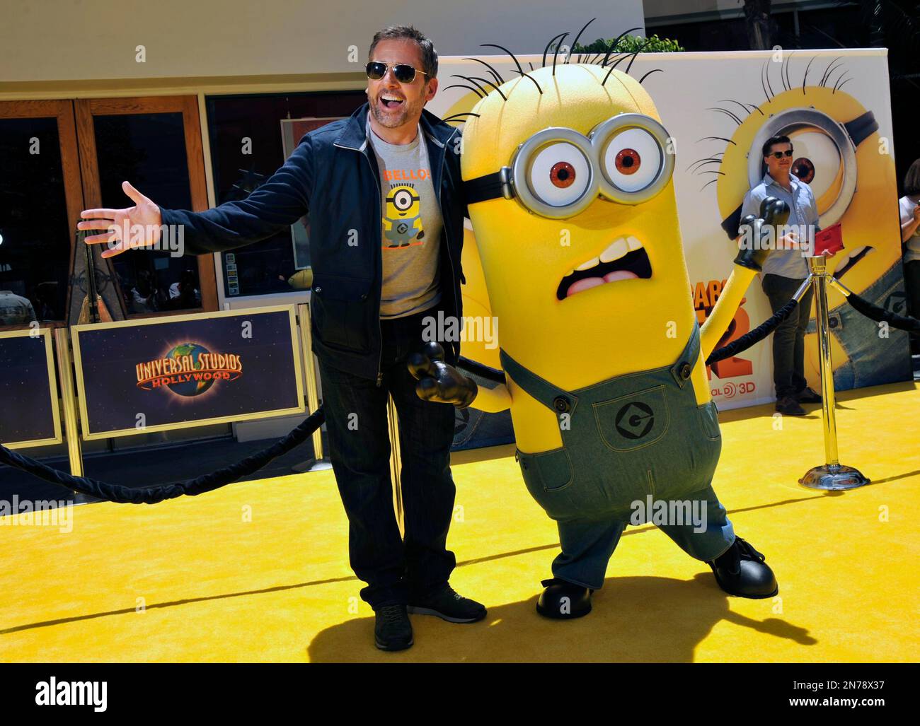 Steve Carell, a cast member in "Despicable Me 2," poses with a minion ...