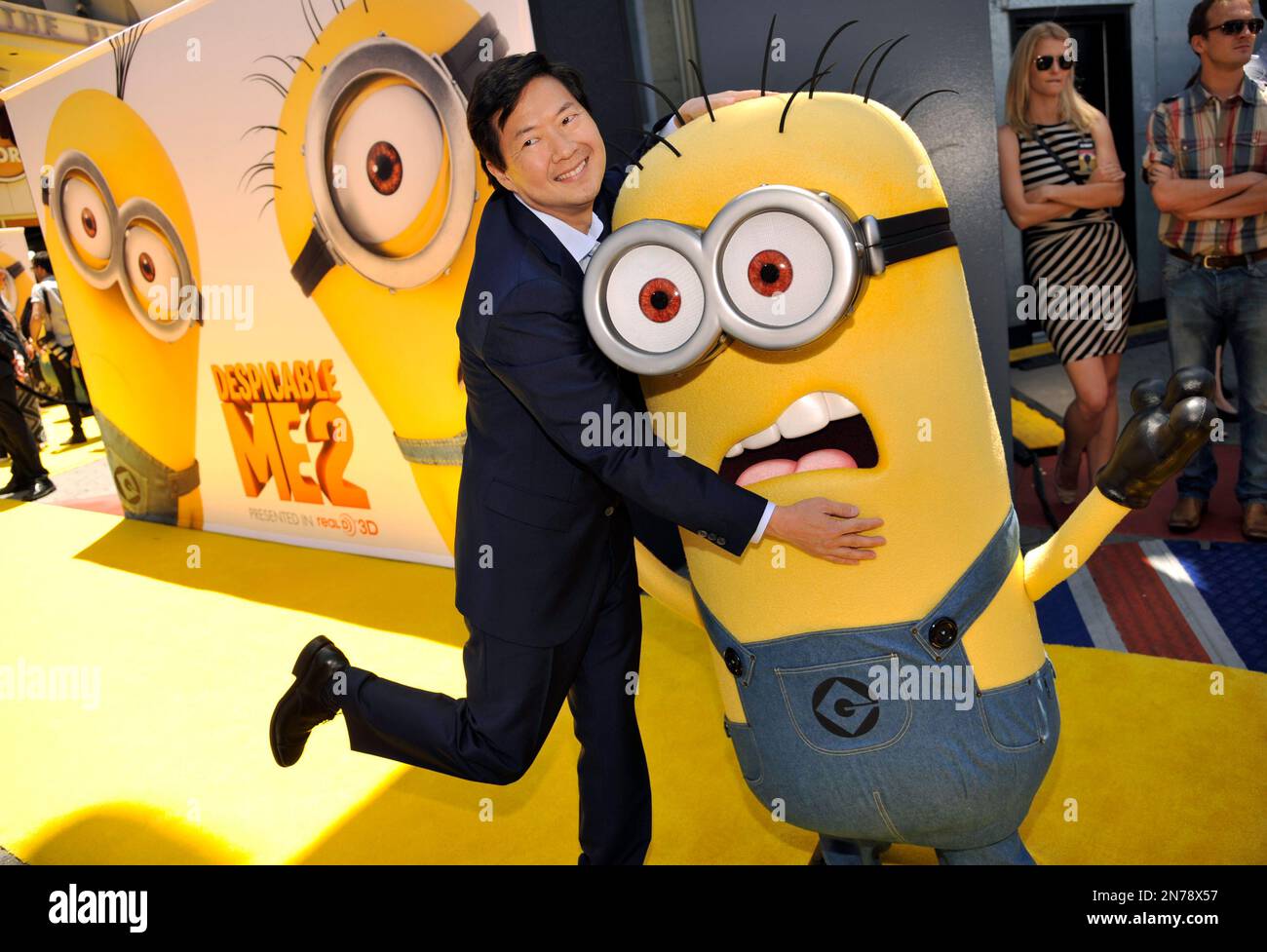 Ken Jeong, a cast member in "Despicable Me 2," poses with a minion ...