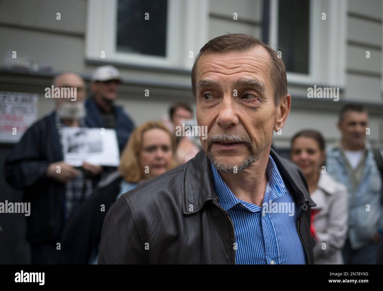 Russian human rights activist Lev Ponomarev speaks to the media at the ...