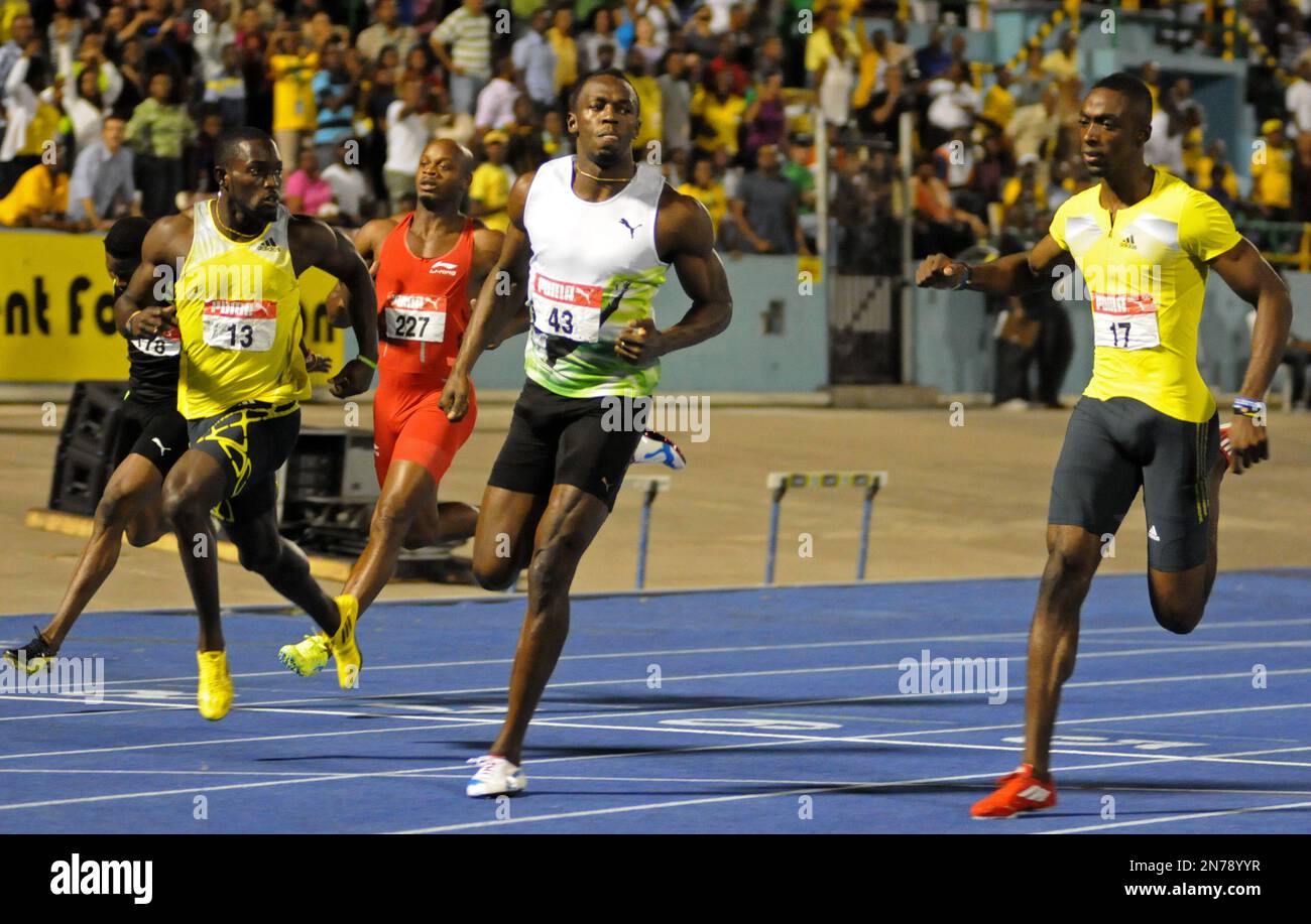 Jamaica's sprinter Usain Bolt, second from right, wins the 100m dash ...