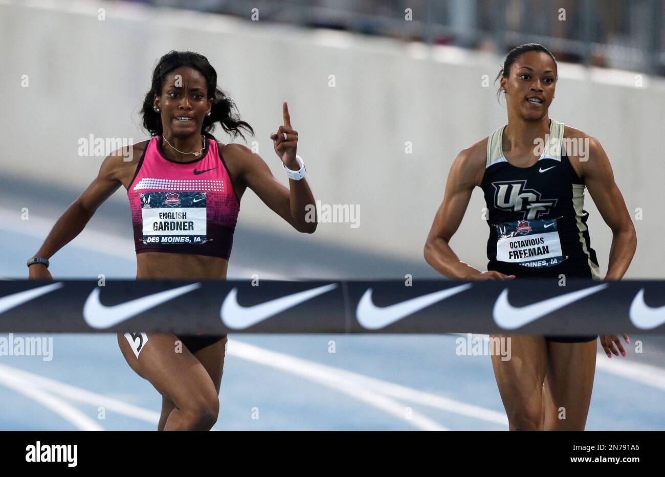 English Gardner, left, defeats Octavious Freeman to the finish line in ...