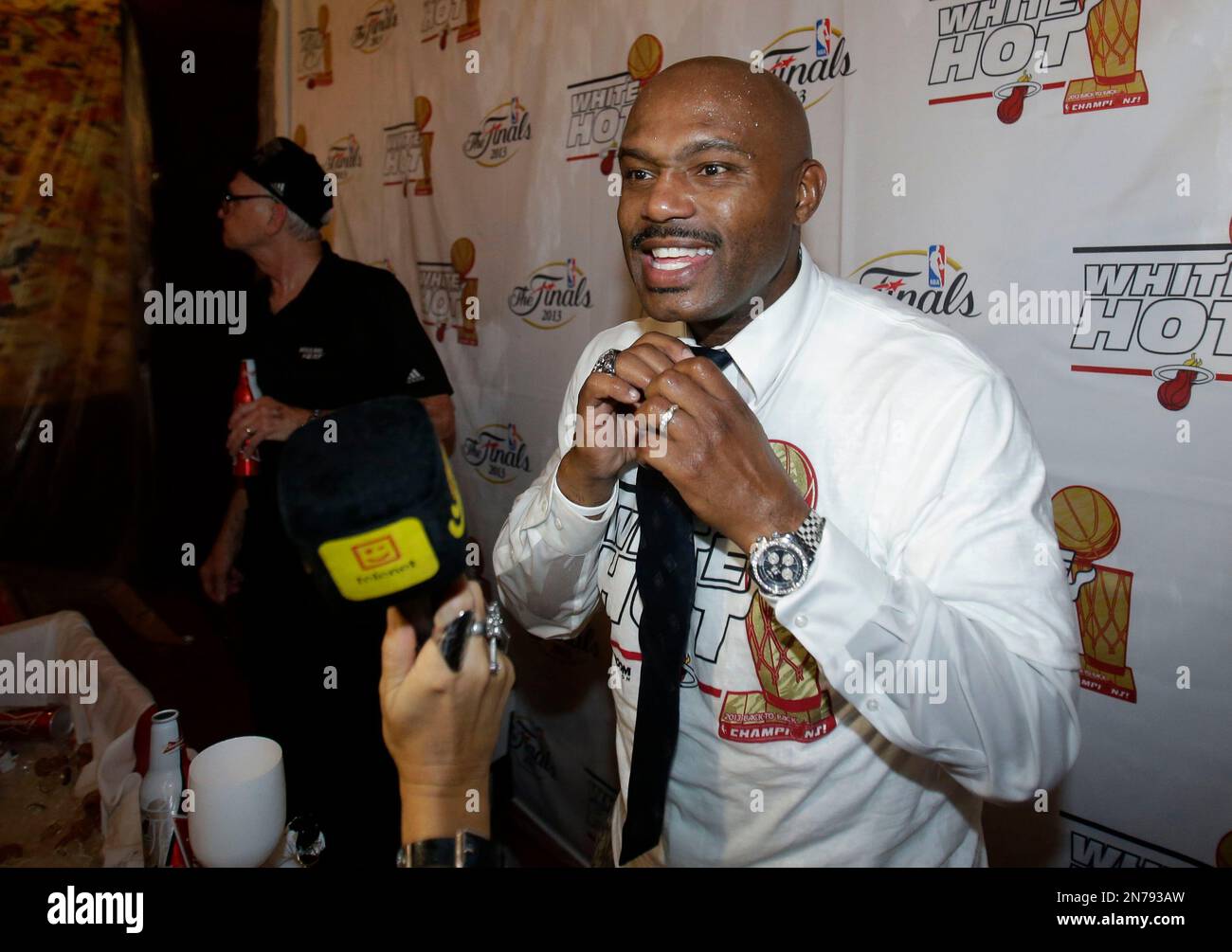 Former Miami Heat players Tim Hardaway speaks following the team's ...