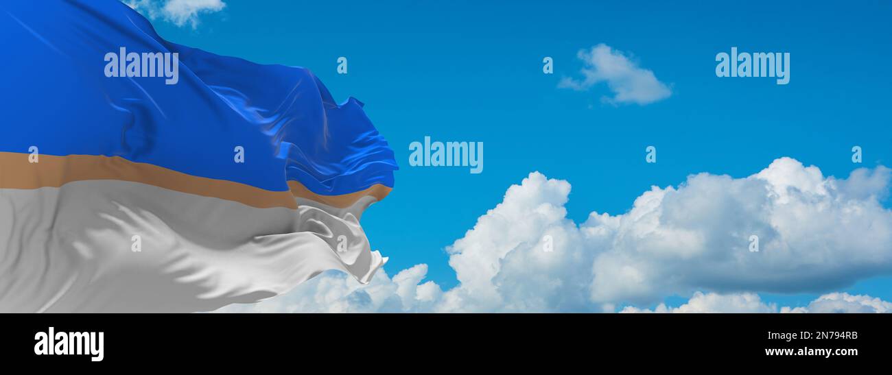 official flag of Mistissini, Quebec Canada at cloudy sky background on ...