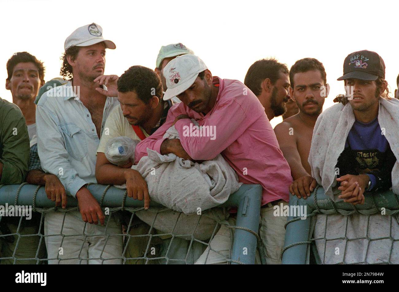 A group of Cuban refugees wait at the Guantanamo Base in Cuba, Aug. 27 ...