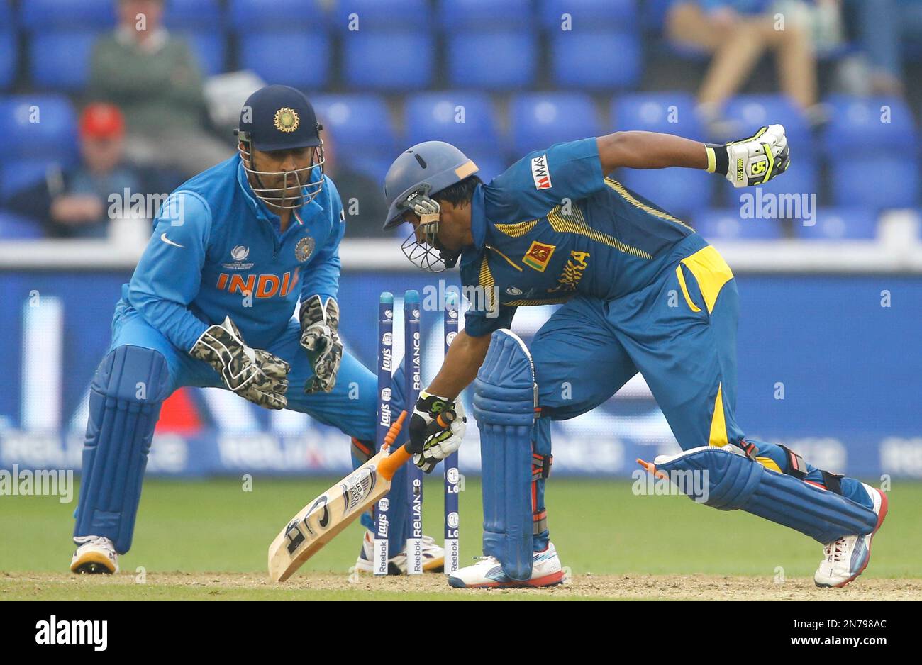 Sri Lanka's Jeevan Mendis is stumped by India's MS Dhoni during an ICC ...