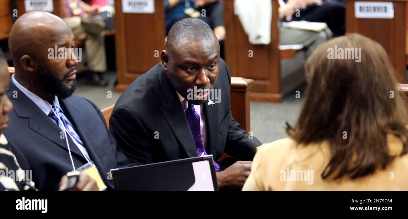 Tracy Martin, left, father of Trayvon Martin, with attorney Benjamin ...