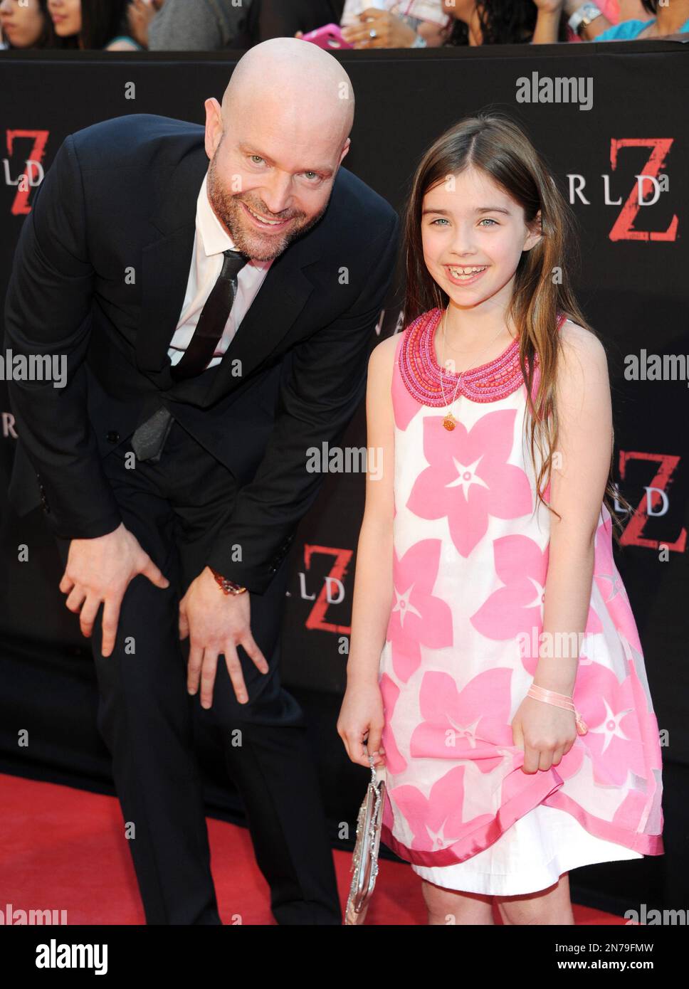 Director Marc Forster and actress Sterling Jerins attend the premiere ...