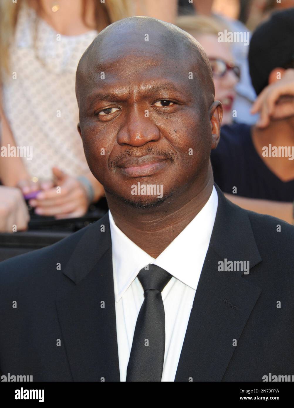 Actor Fana Mokoena attends the premiere of "World War Z" in Times ...