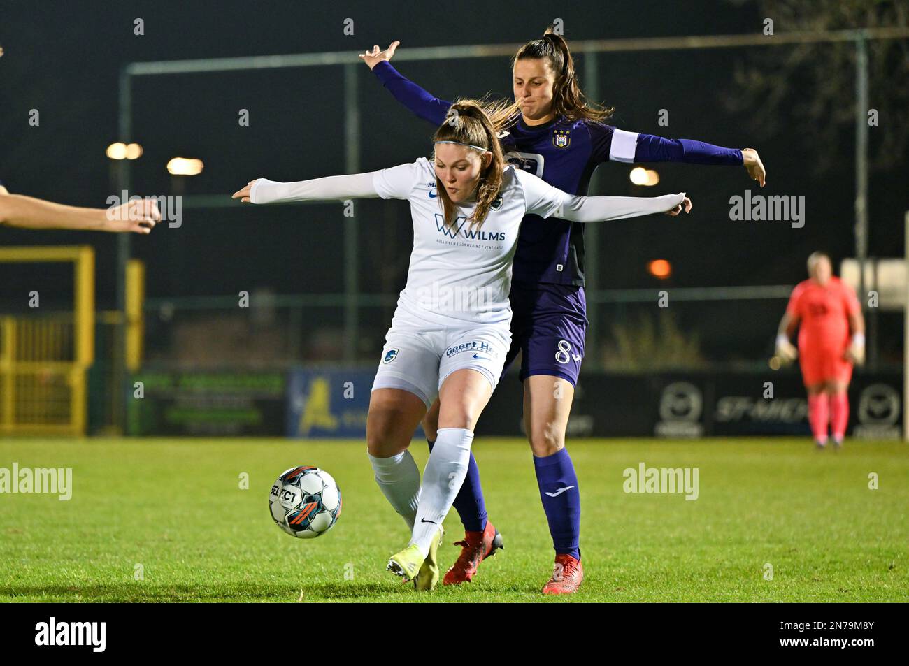 Joy Kersten (20) of Genk pictured fighting for the ball with Laura De ...