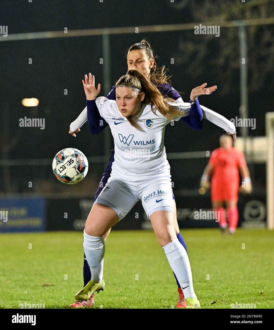 Joy Kersten (20) of Genk pictured fighting for the ball with Laura De ...