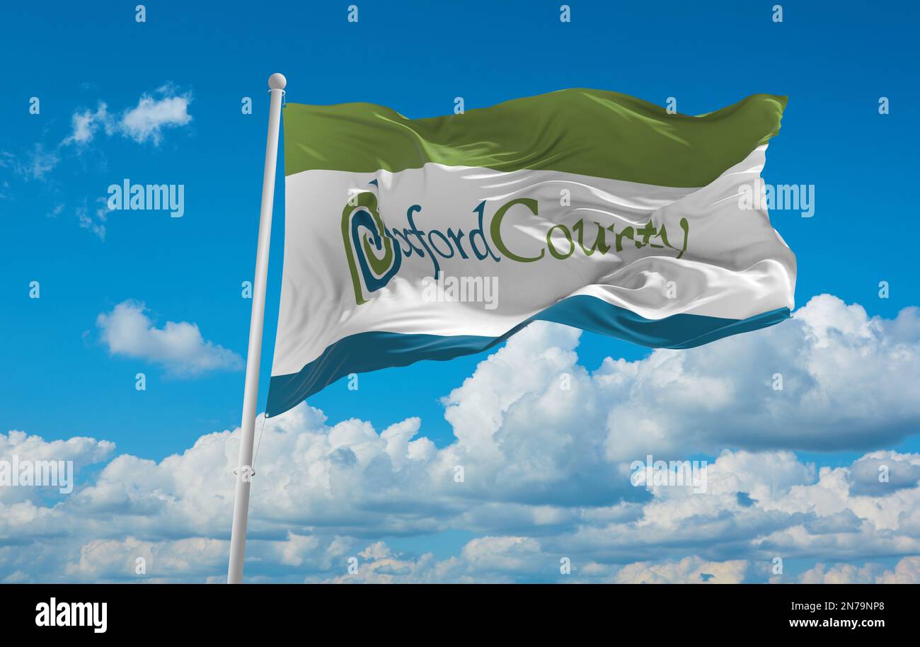 official flag of Oxford County Canada at cloudy sky background on ...