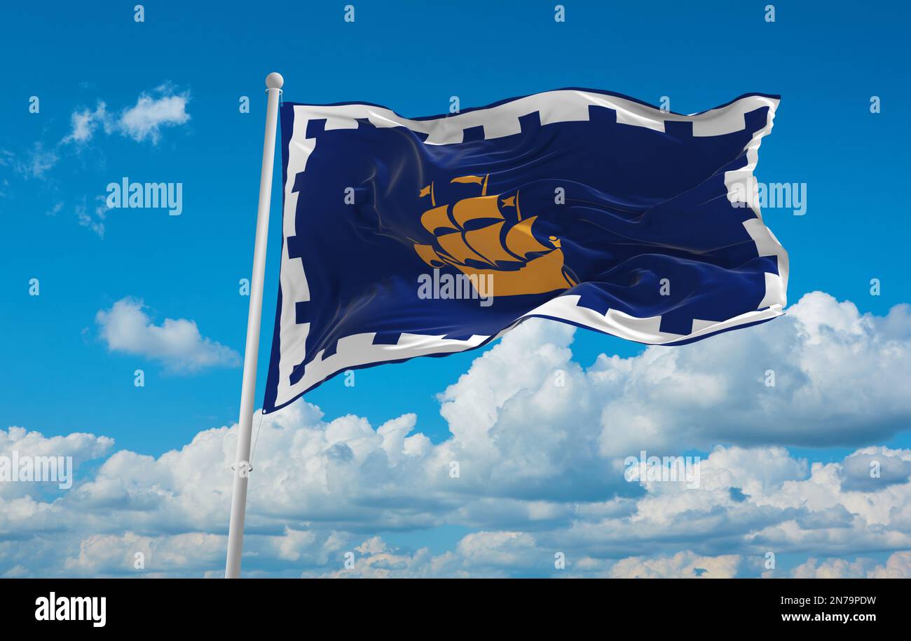 official flag of Quebec City Canada at cloudy sky background on sunset ...