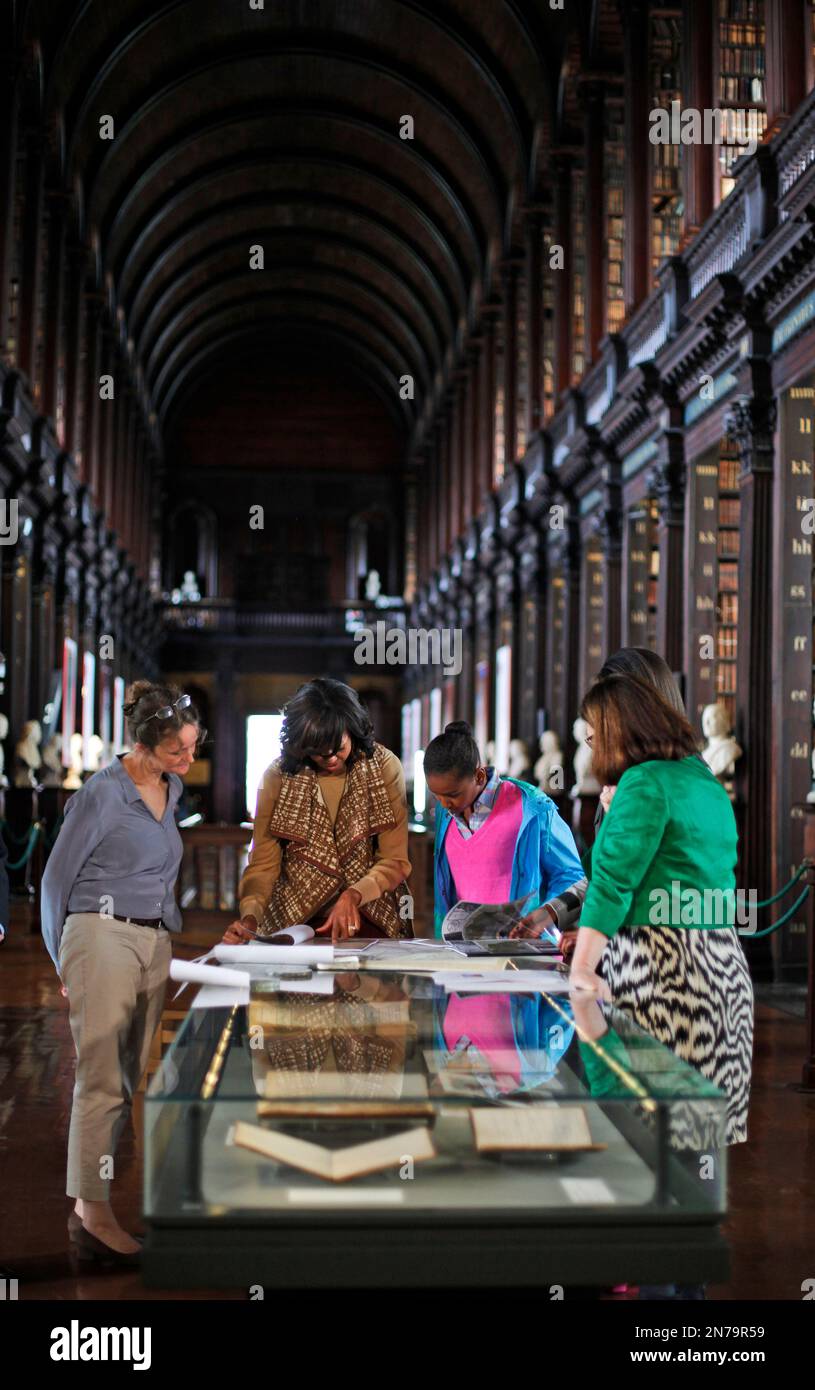 US first lady Michelle Obama, center, with her daughters Sasha, and ...