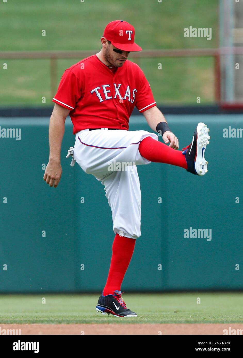 Texas Rangers Second Baseman Ian Kinsler Warms Up Before A Baseball
