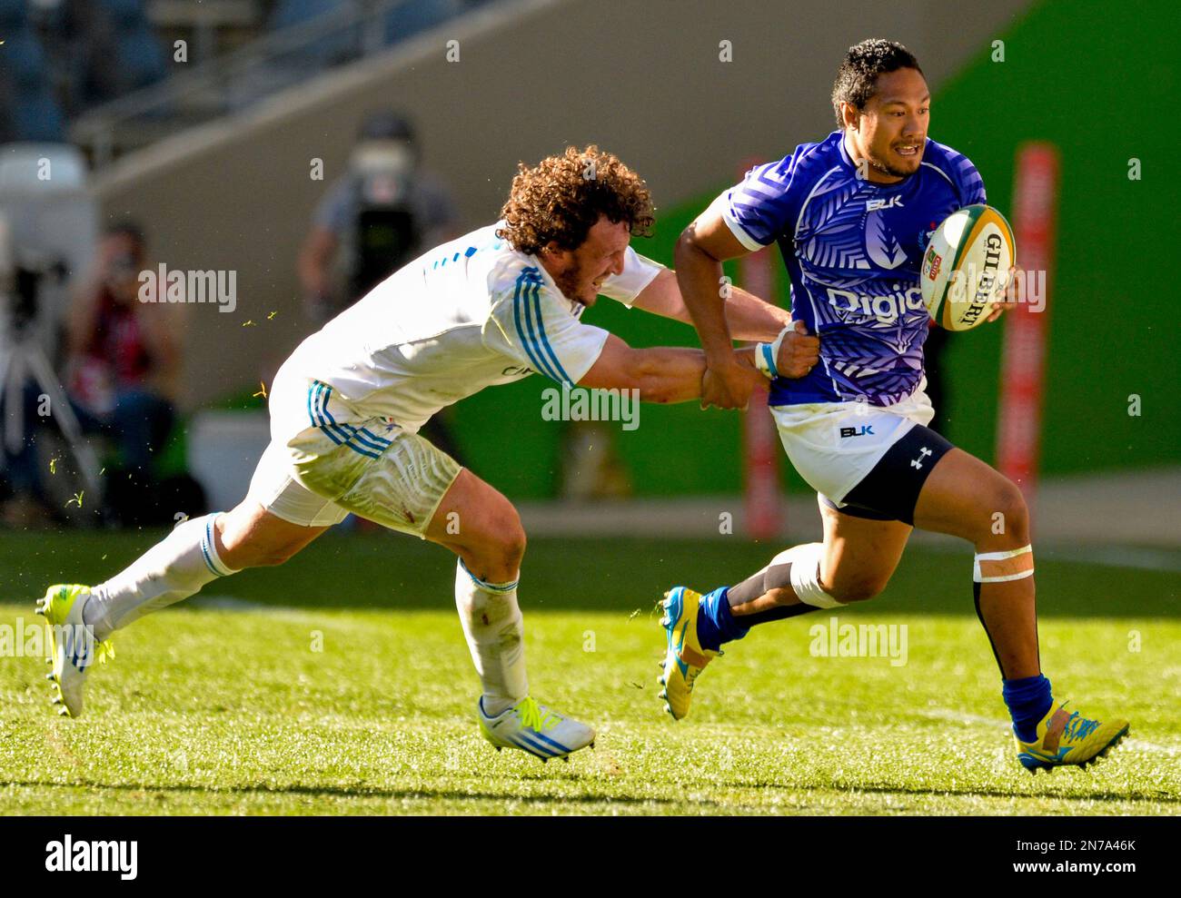 Samoa's James So'oialo, right, with Italy's Mauro Bergamasco, left, on ...