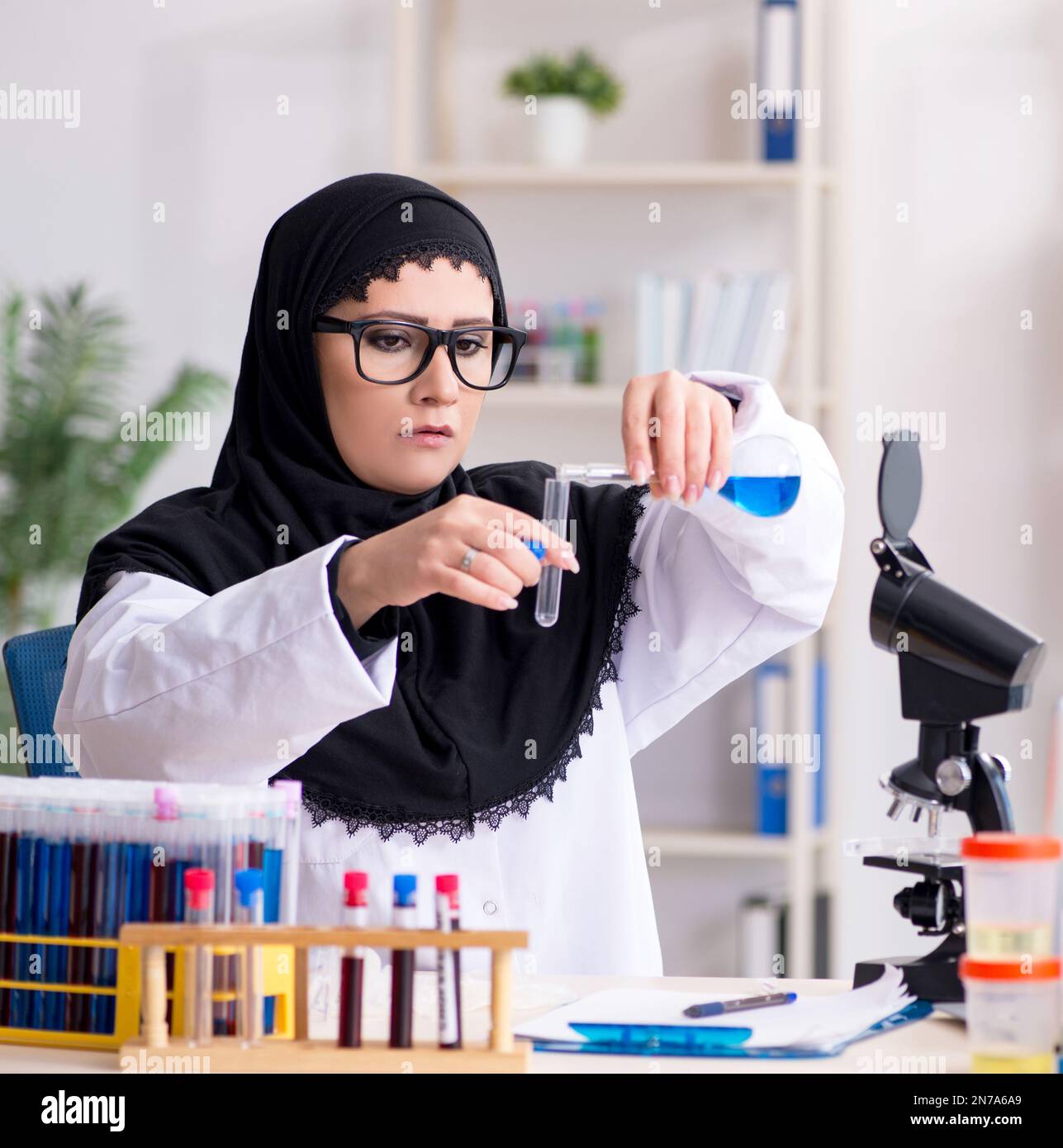 Female scientist in hijab hi-res stock photography and images - Alamy