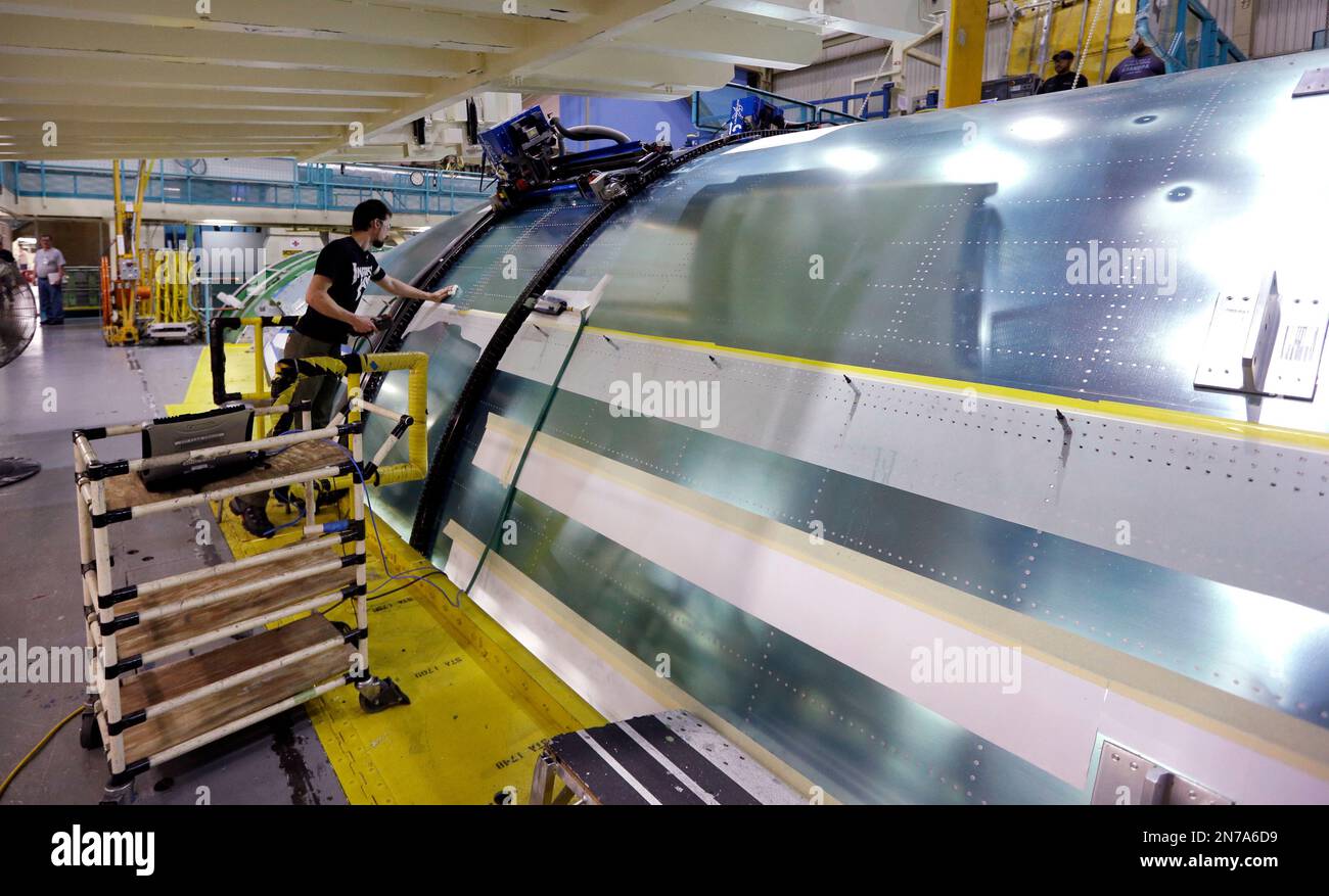 In this photo taken Wednesday, May 29, 2013, Boeing employee Dane Hart ...
