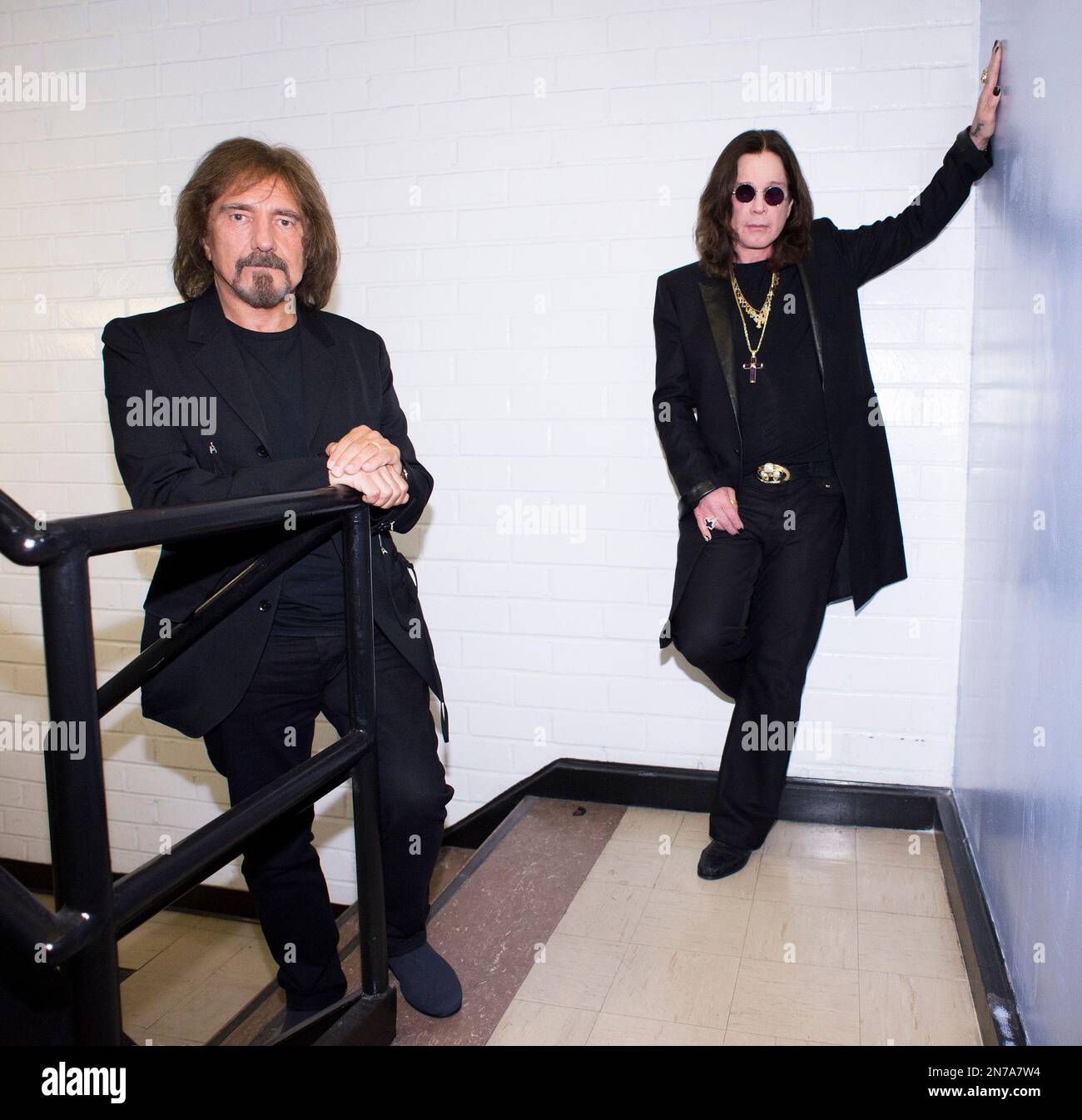 This June 6, 2013 photo shows singer Ozzy Osbourne, right, and musician ...