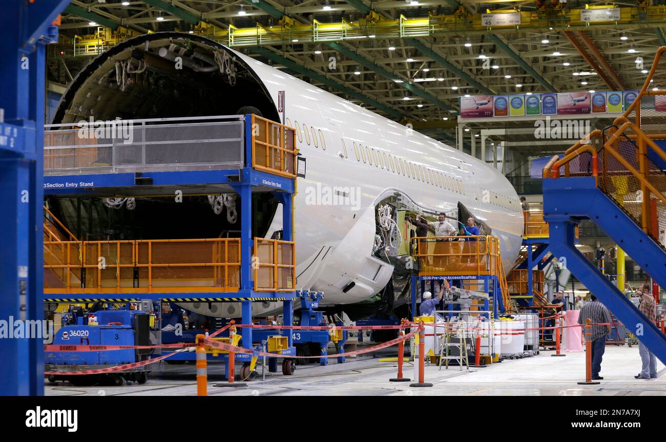 In this photo taken Wednesday, May 29, 2013, a portion of the fuselage ...