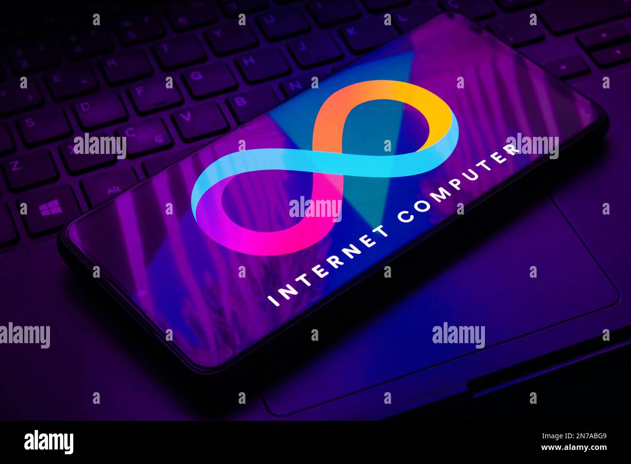 In this photo illustration the Internet Computer logo seen displayed on ...