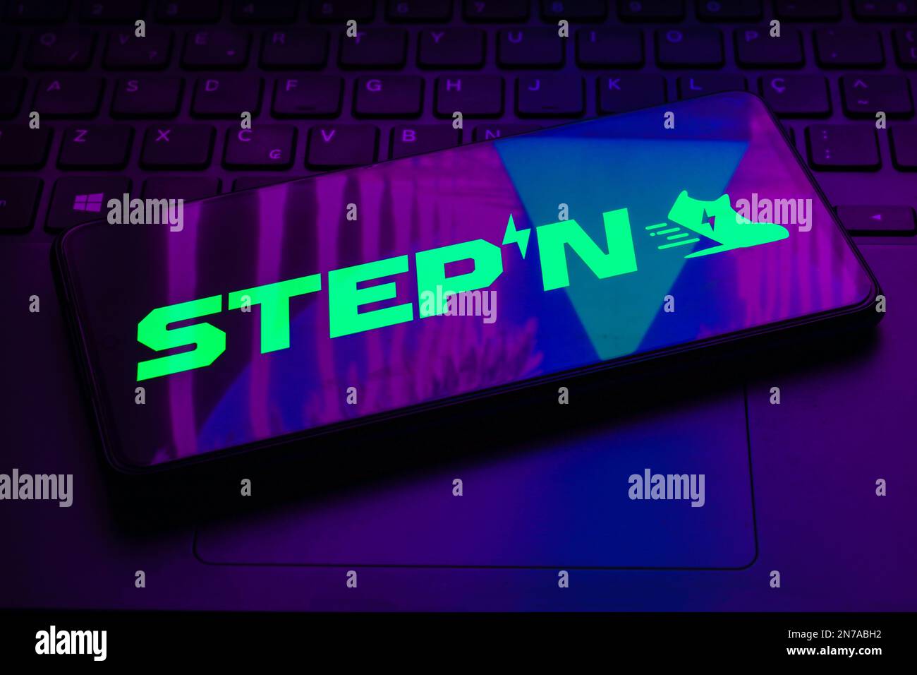 In this photo illustration the STEPN logo seen displayed on a smartphone Stock Photo - Alamy
